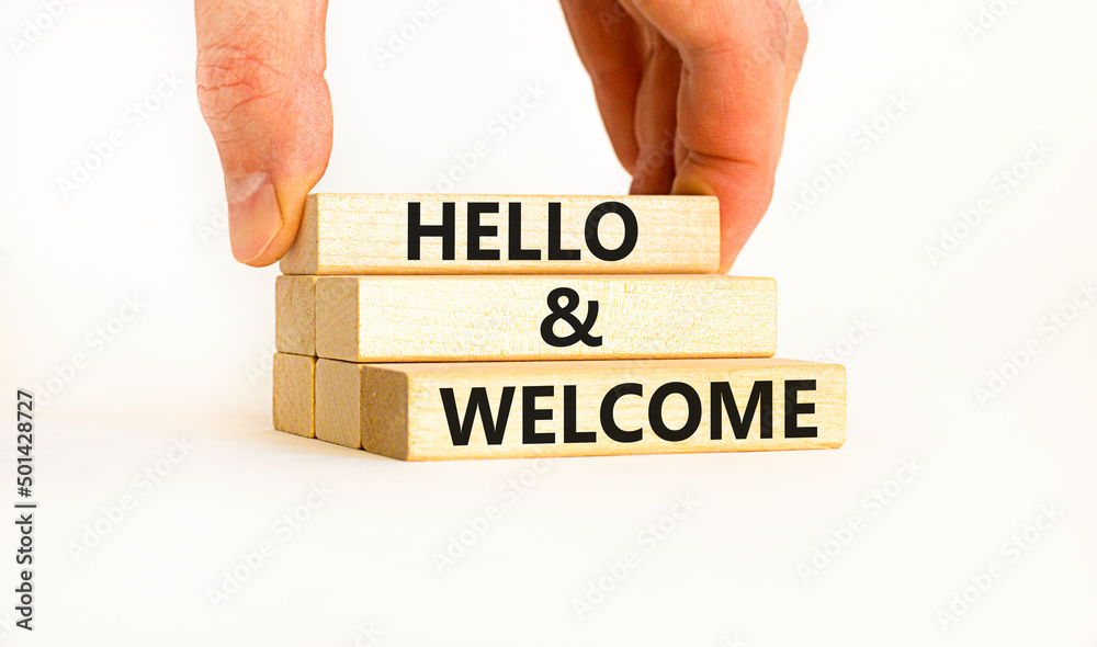Hello and welcome symbol. Concept words Hello and welcome on wooden ...