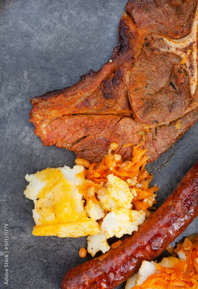 Flat lay of Traditional South African Braai or Shisa nyama, meat cooked ...