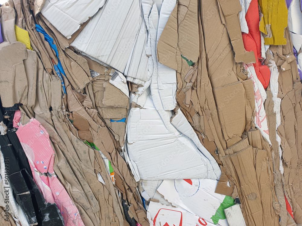 selective sorting of cardboard waste background. cardboard packaging ...