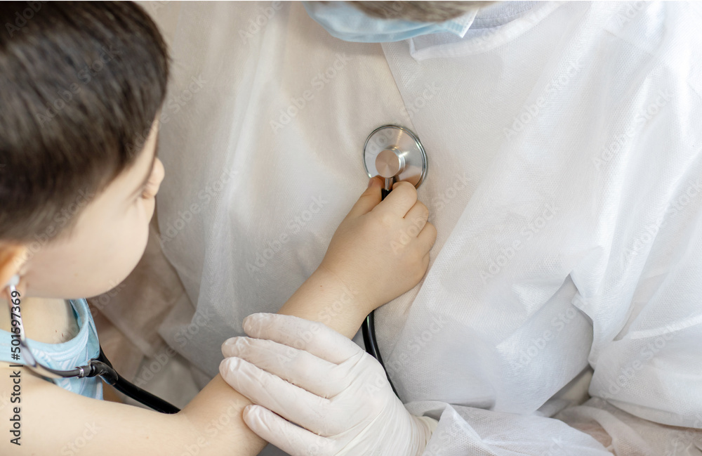 little boy, kid, and nurse, doctor. to prevent fear,doctor let the ...