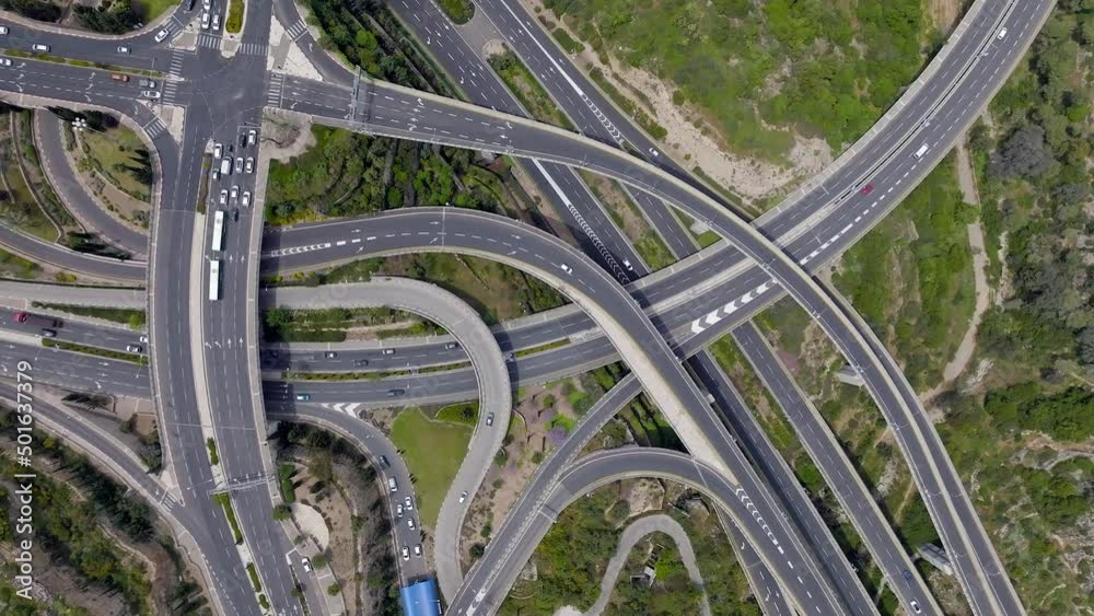 Massive multi level highway interchange with traffic on all routes ...