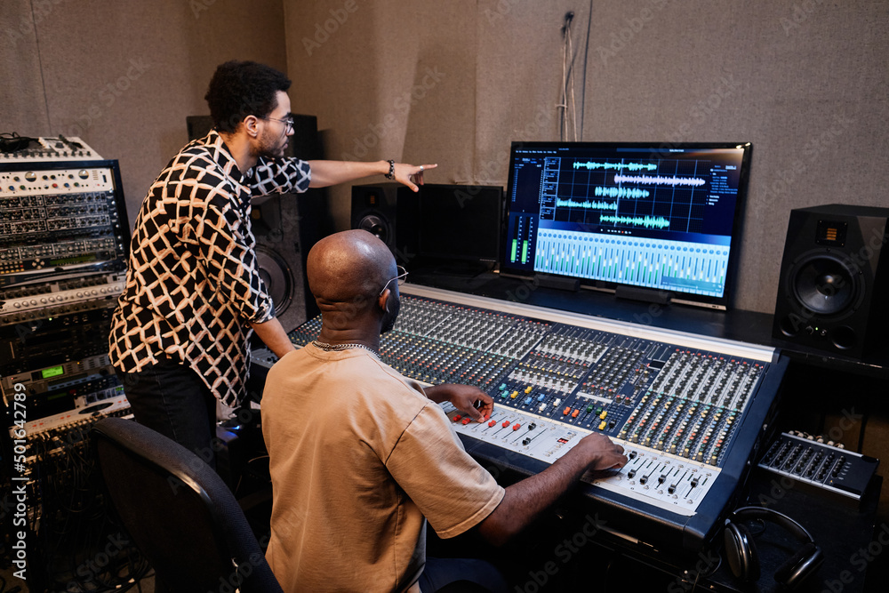 Professional African American producer and musician creating music ...