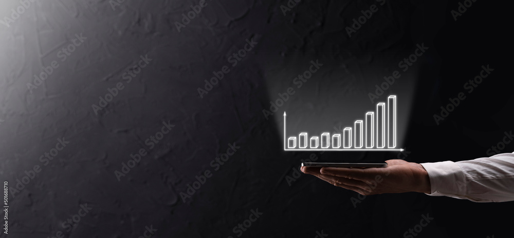 Businessman holding graph growth and increase of chart positive ...