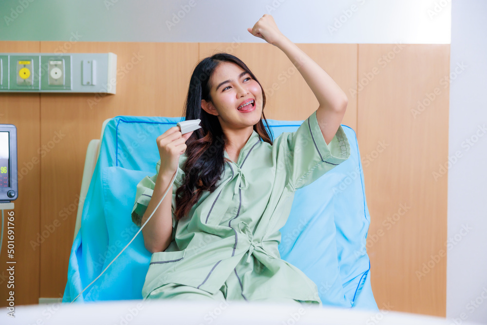 Happy excited successful Beautiful woman patient triumphing in modern ...