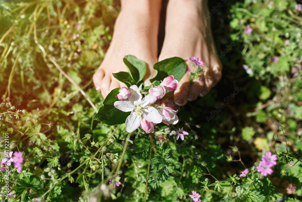 Foto de Beautiful feet with clean skin of a girl or a woman. Spring ...