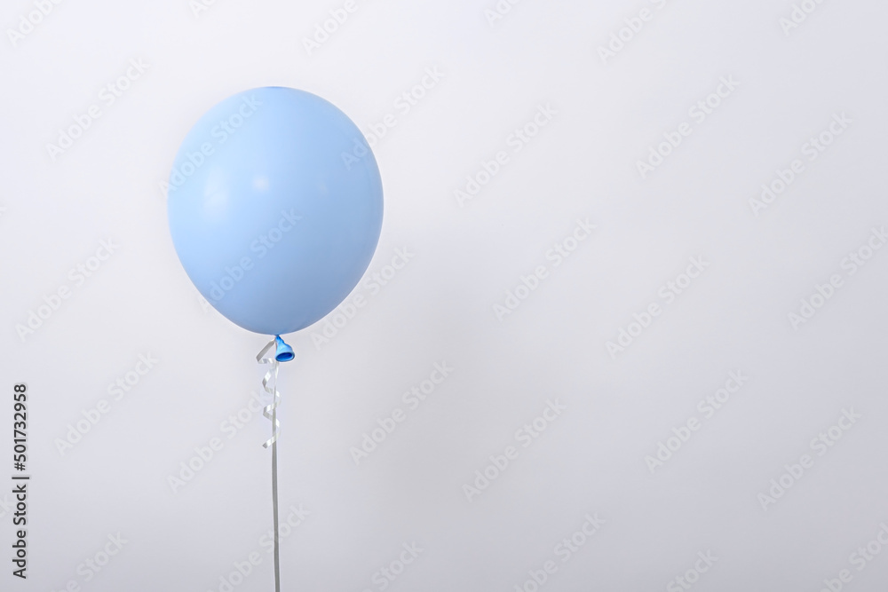 one minimal blue balloon on white background, copy space, element of ...