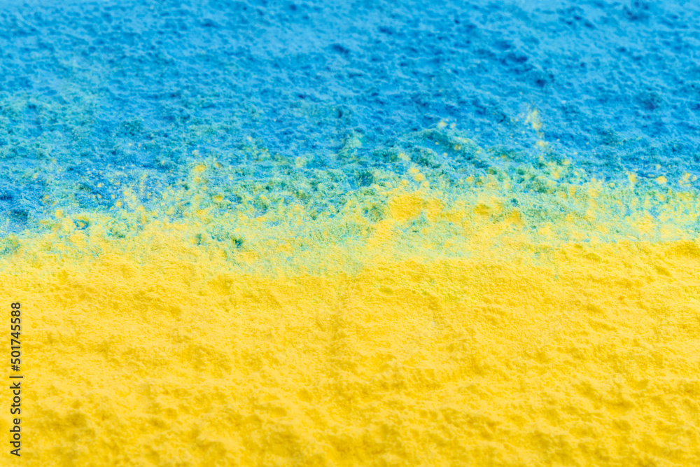 colorful Ukrainan flag yellow blue color holi paint powder explosion ...