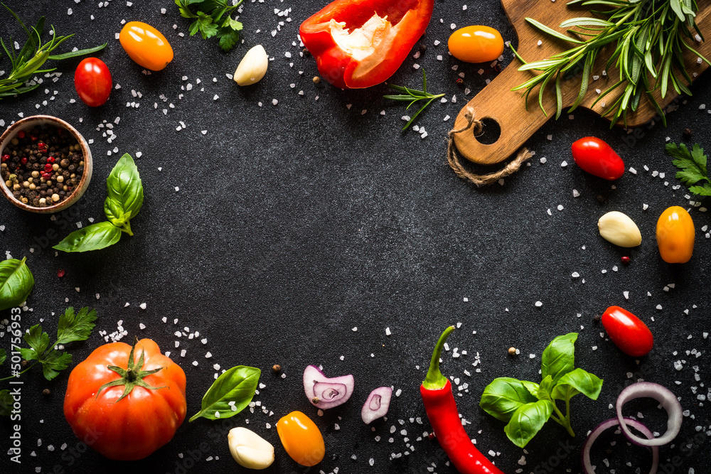 Food frame. Food cooking background on black stone table. Fresh ...