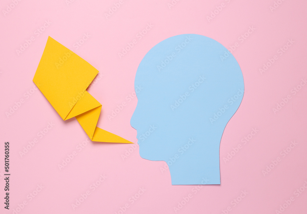 Paper cut human head with yellow blank dialog cloud on pink background ...