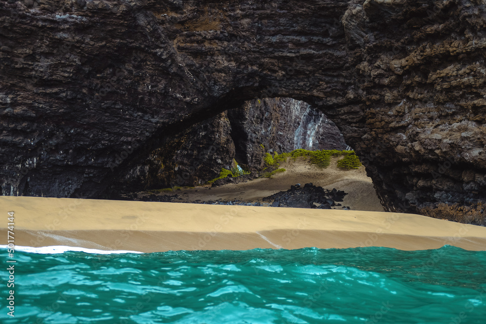 Deep sea caves and rocky formations on the Napali coast of the Hawaiian ...
