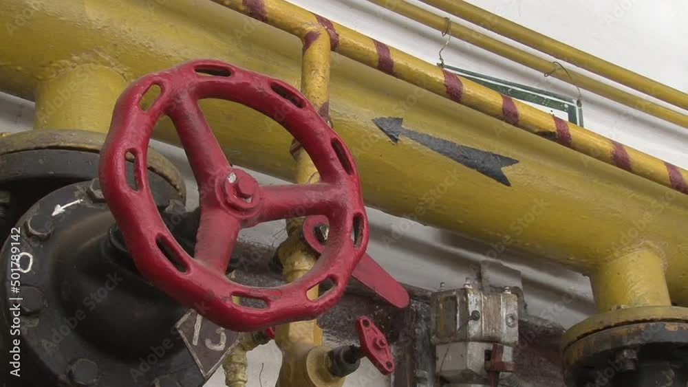 Boiler room with pipes, valves and sensors.Manometer, pipes and faucet ...