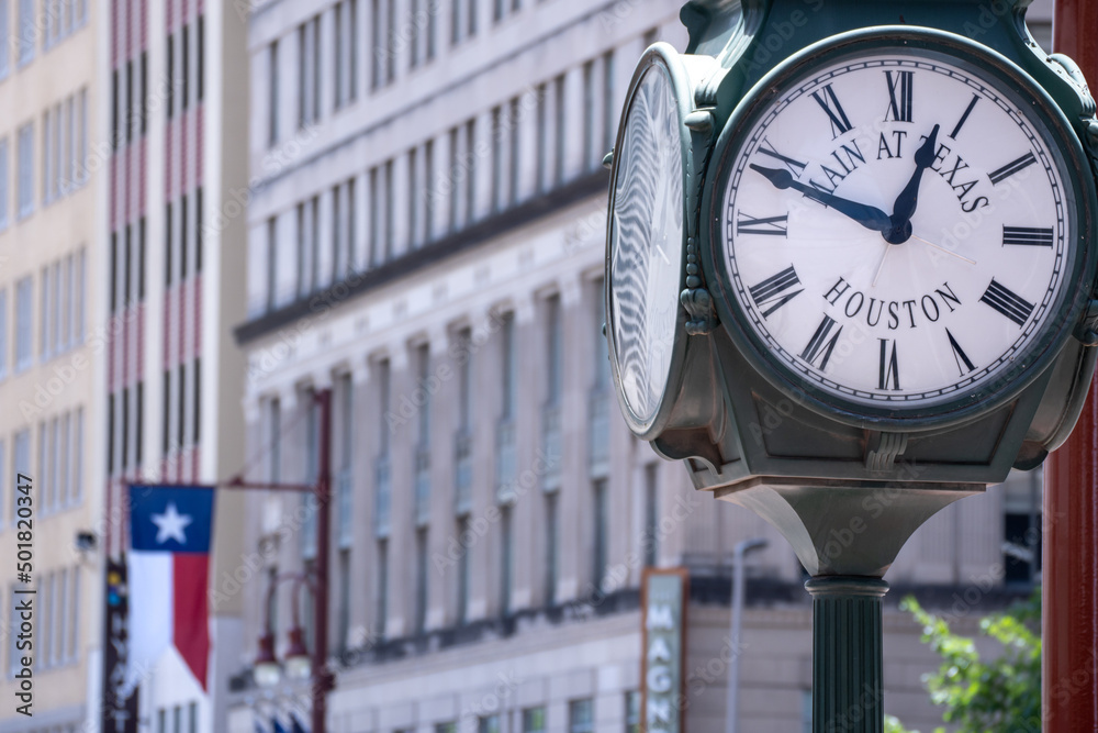 Roman Numerals Clock with Texas Flag in Background in Downtown Houston ...