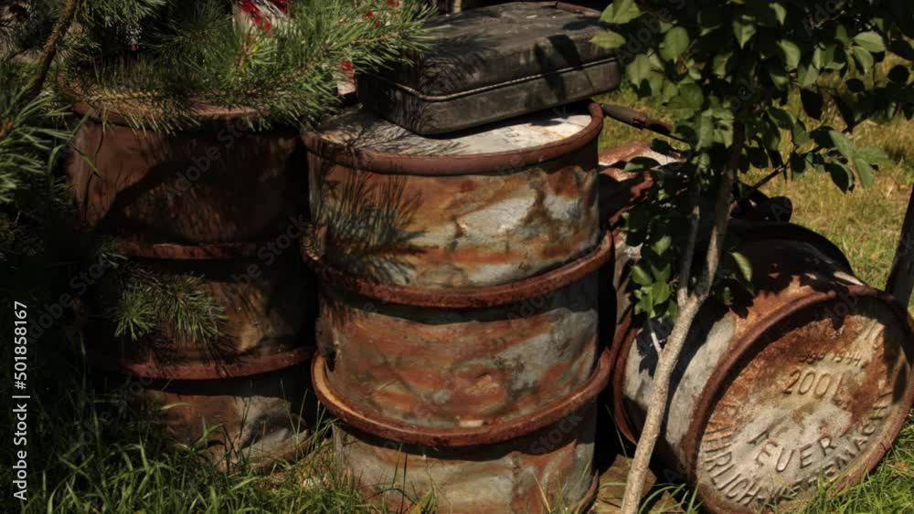 Rusty destroyed fuel barrels on the outside, military elements after ...