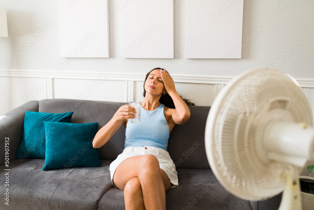 Sad woman trying to cool down Stock Photo | Adobe Stock