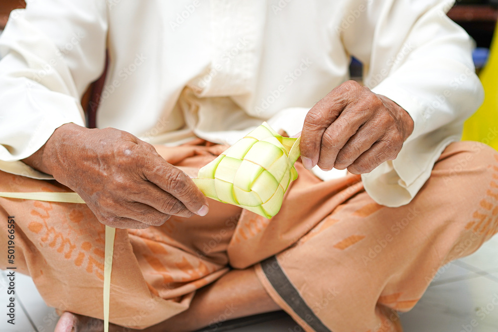 The process of making Ketupat wrappers from young coconut leaves ...