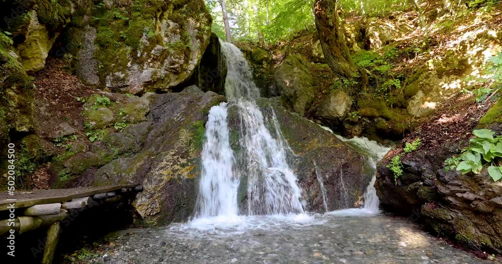 Vídeo do Stock: Fairy waterfall at wild forest. Wonderful fresh water ...