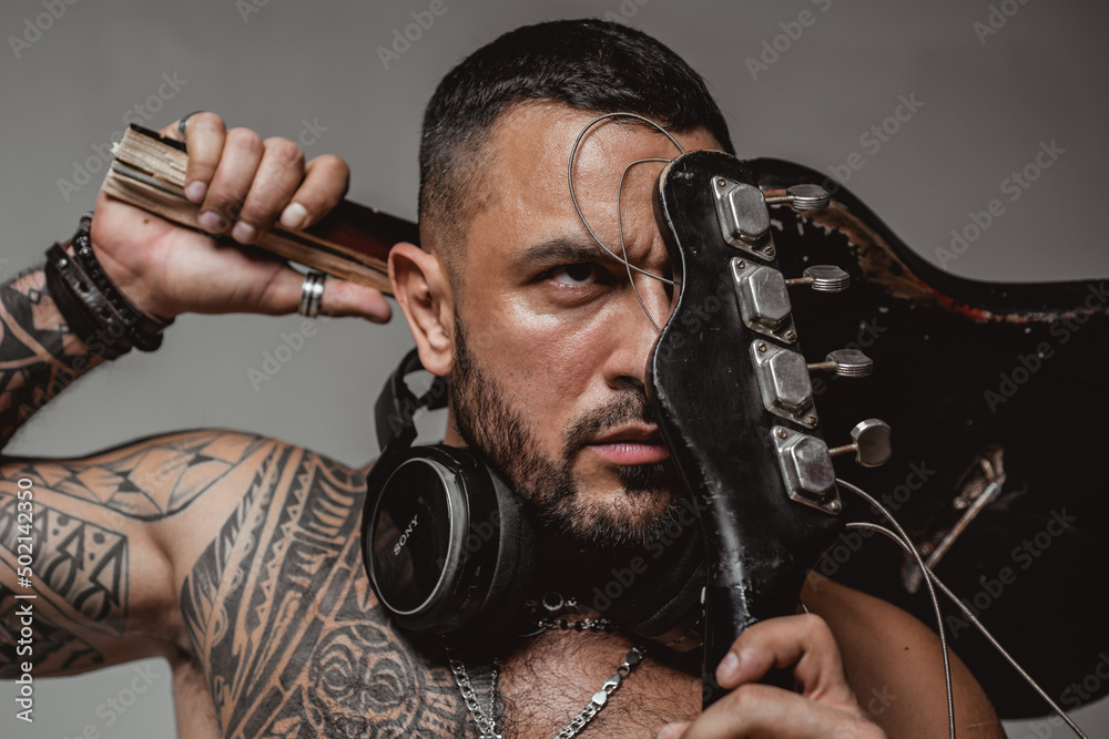 Play the guitar. Chest muscles, Six pack. Electric guitar. Music ...