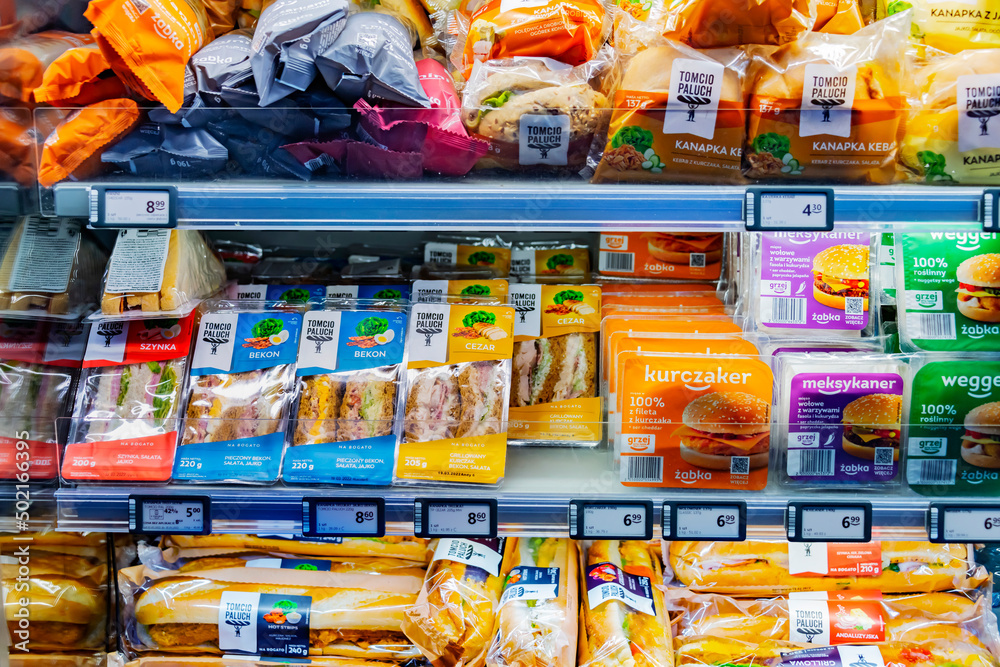 Pre-packaged foods displayed in a commercial refrigerator Stock Photo ...