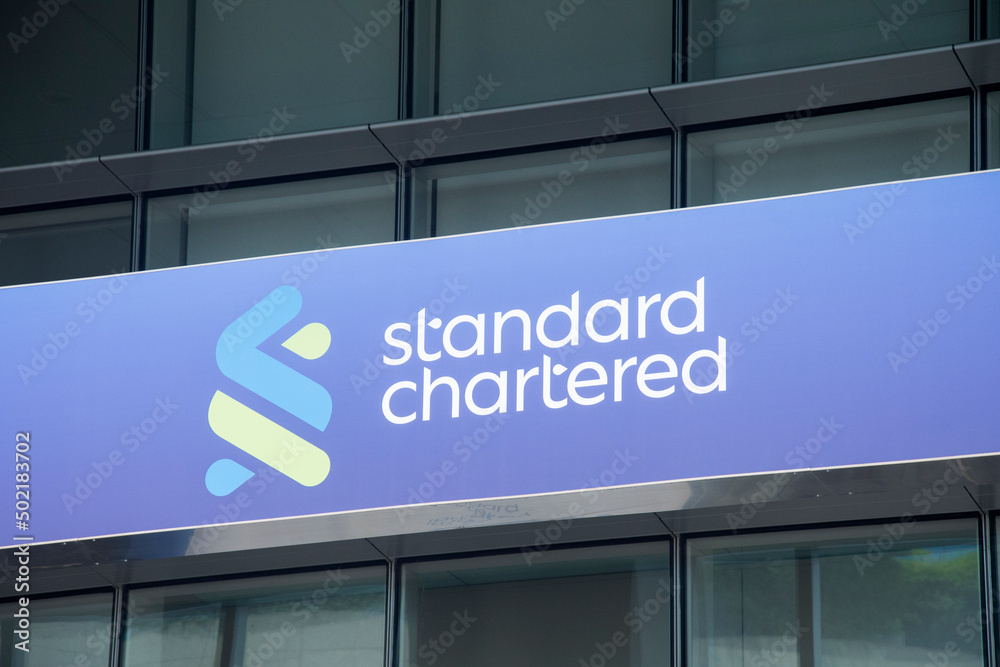Standard Chartered sign located Marina Bay Financial Center, Singapore ...