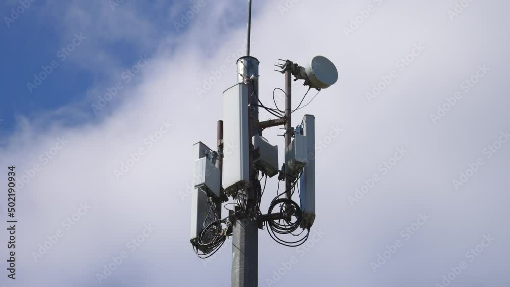 Cell Towers close up on sky background. Cellular GSM tower with 3g, 5g ...