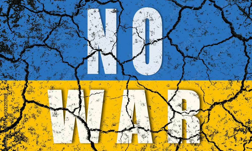 ''No war'' on the Ukrainian flag on broken ground. The concept of the ...