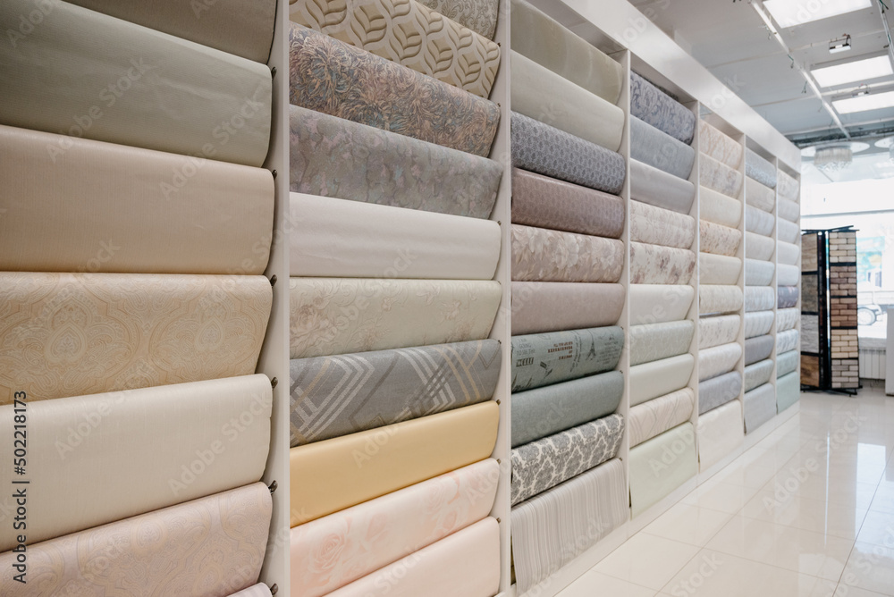 Samples of different wallpapers on store window racks Stock Photo ...