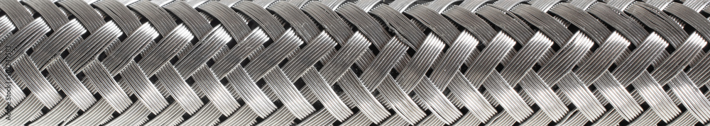 Foto de steel braided tube with a visible texture do Stock | Adobe Stock