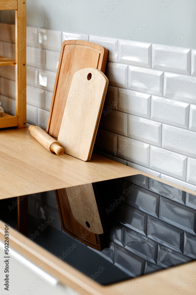 Vertical background image of minimal kitchen interior with focus on ...