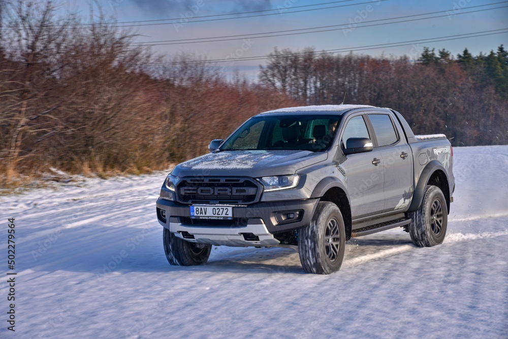 Ford Ranger Raptor. Successful Pick-up in the snow. Car driving in the ...