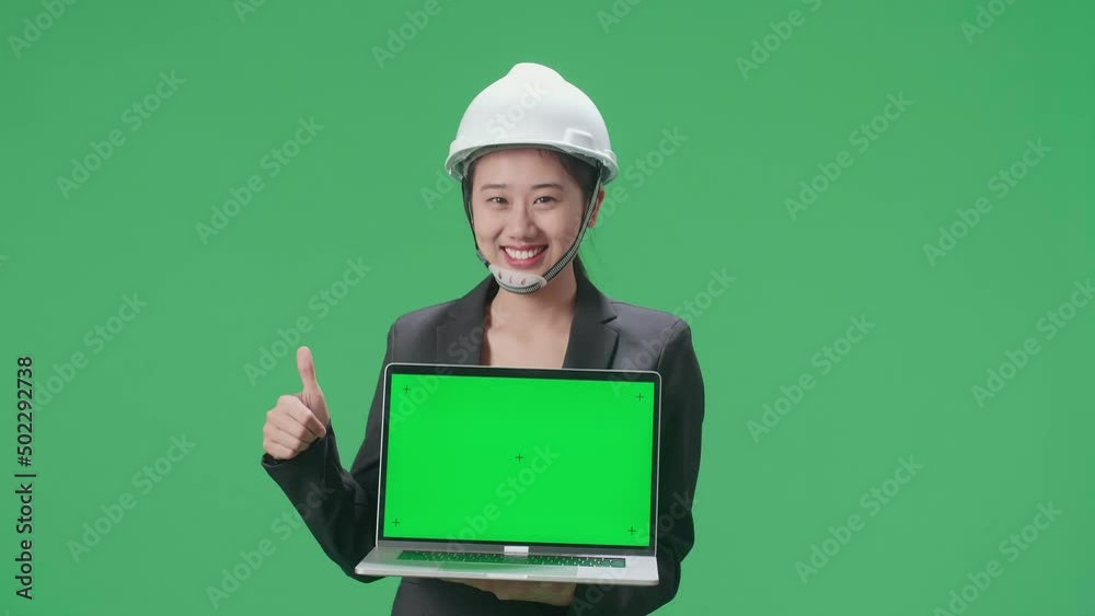 Smiling Asian Female Engineer With Green Screen Laptop Showing Thumbs ...