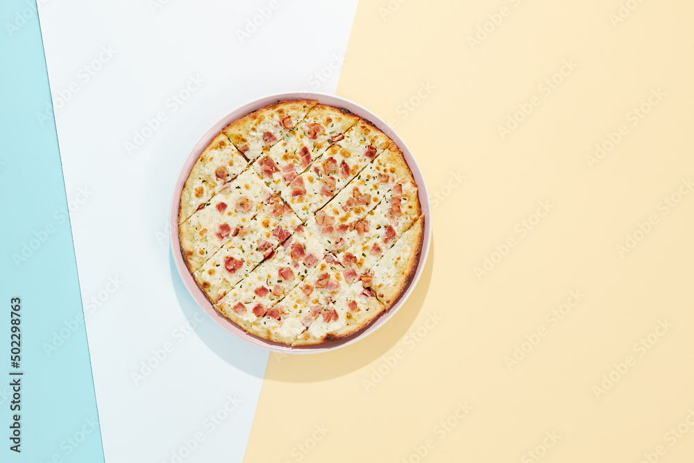 Italian pizza with bacon and cheese on coloured background. Cheese ...