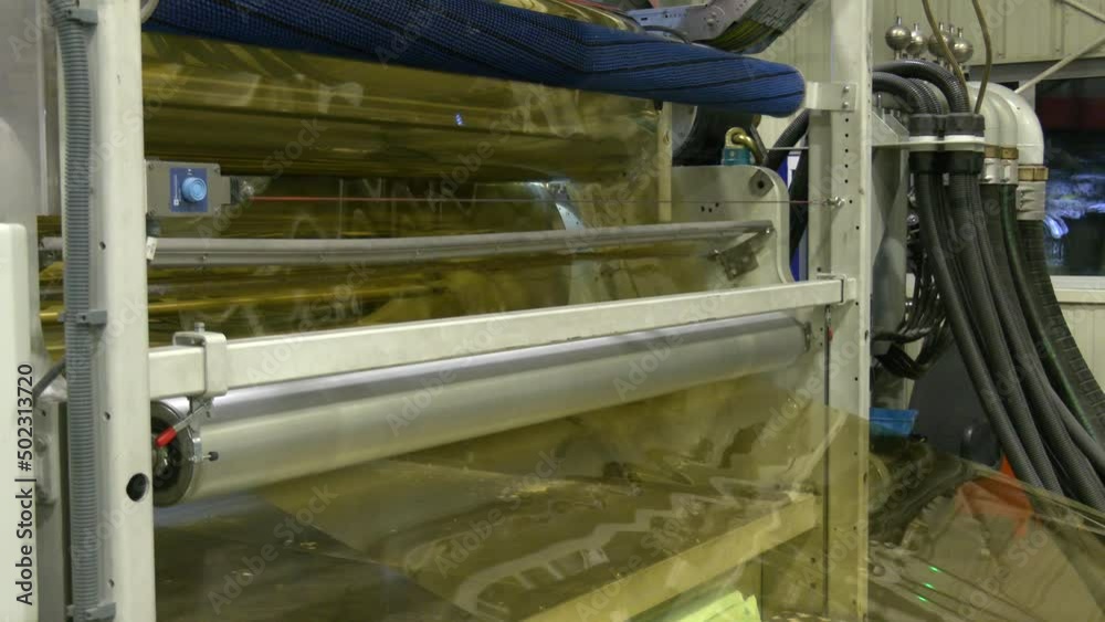 A roll of clear plastic sheet for manufacturing process. Recycling ...