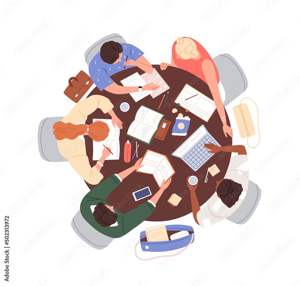 Group of people at table, top view. Students team work at desk with ...