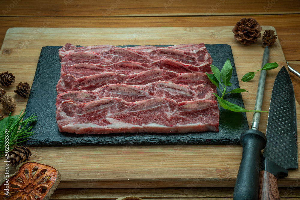 Beef Short Ribs (Sliced) Bone-in on wooden background.Cross Cut Short ...