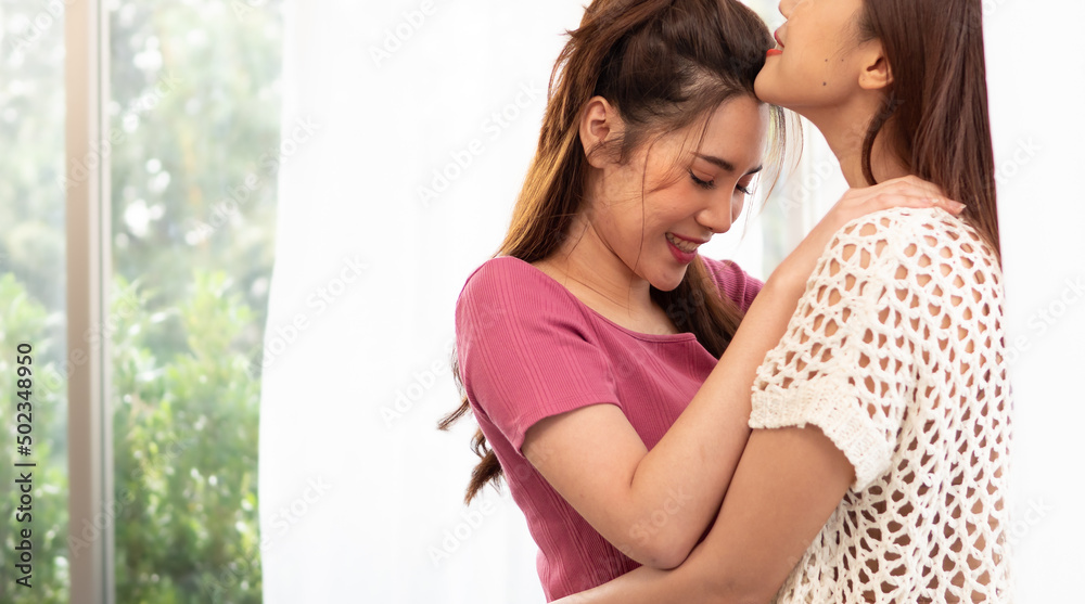 Romantic gay lesbians holding each other smiling. Beautiful sensual ...