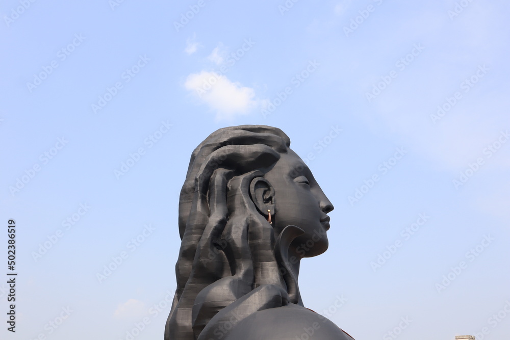 The right side view of the black colored Adi Yogi Shiva statue. Stock ...