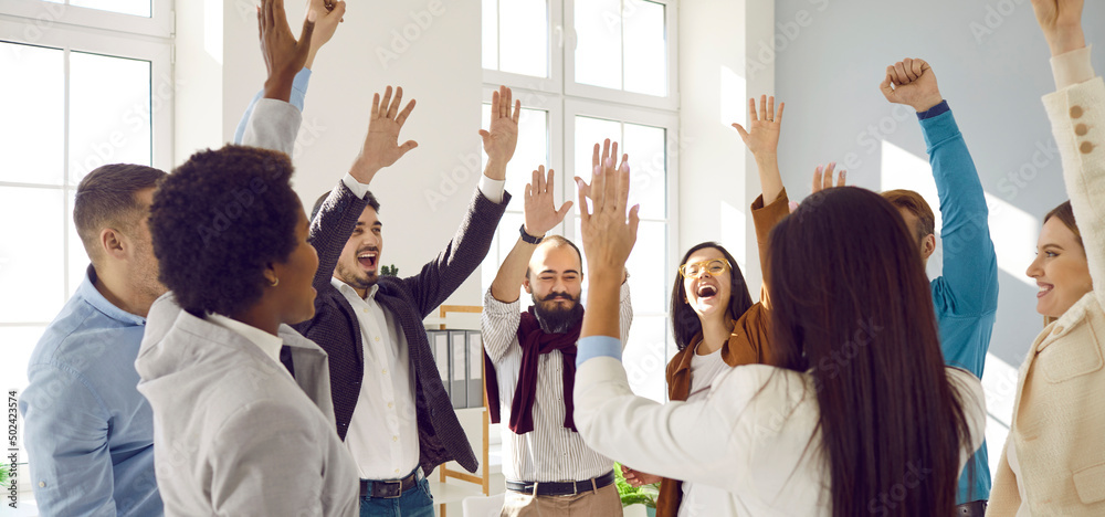 Overjoyed business team cheering, celebrating good sales result, and ...