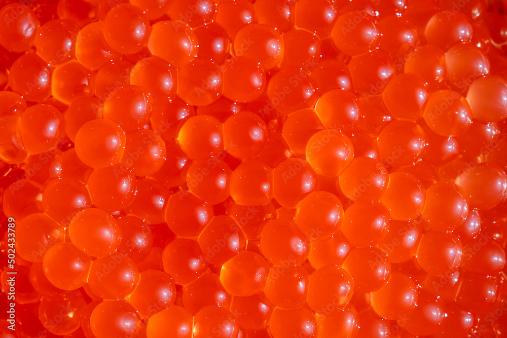 Top view of a bunch of red bobas with a flavor of pomegranate ...