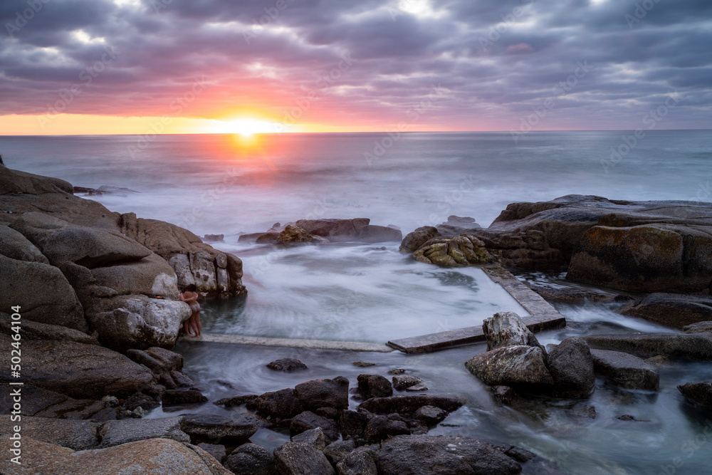 View of Saunders Rock tidal pool summer sunset Bantry Bay, Atlantic ...
