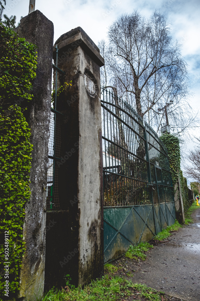 Beautiful old centuries entrance with stone columns with neoclassical ...