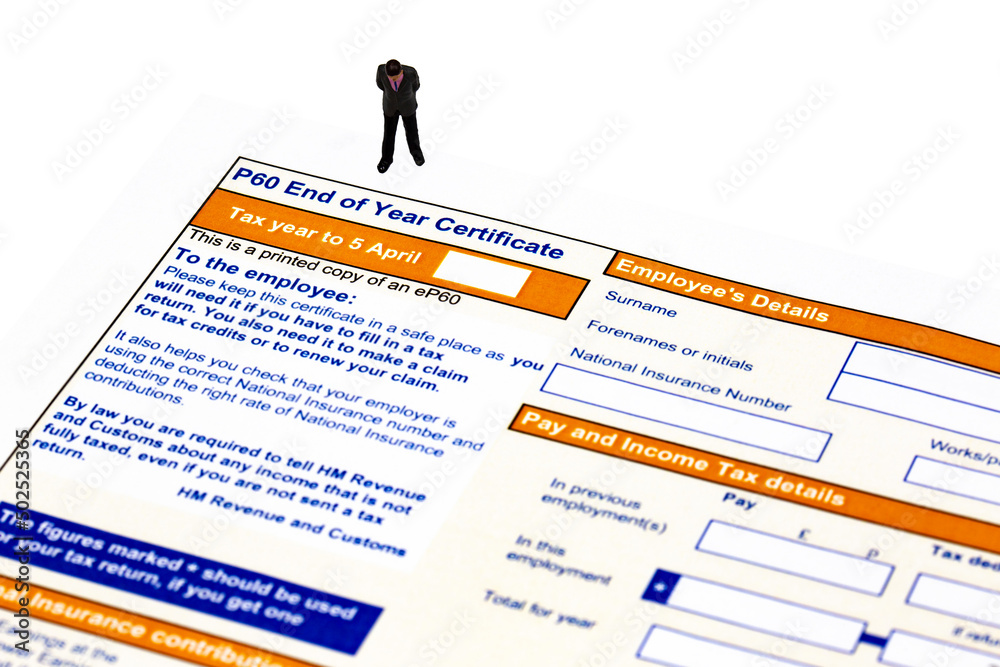 Miniature scale model businessman with a P60 End of year Certificate ...