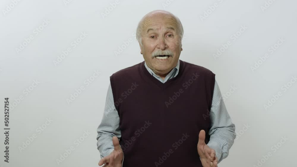Nervous old man is very scared.Studio portrait of old man isolated on ...