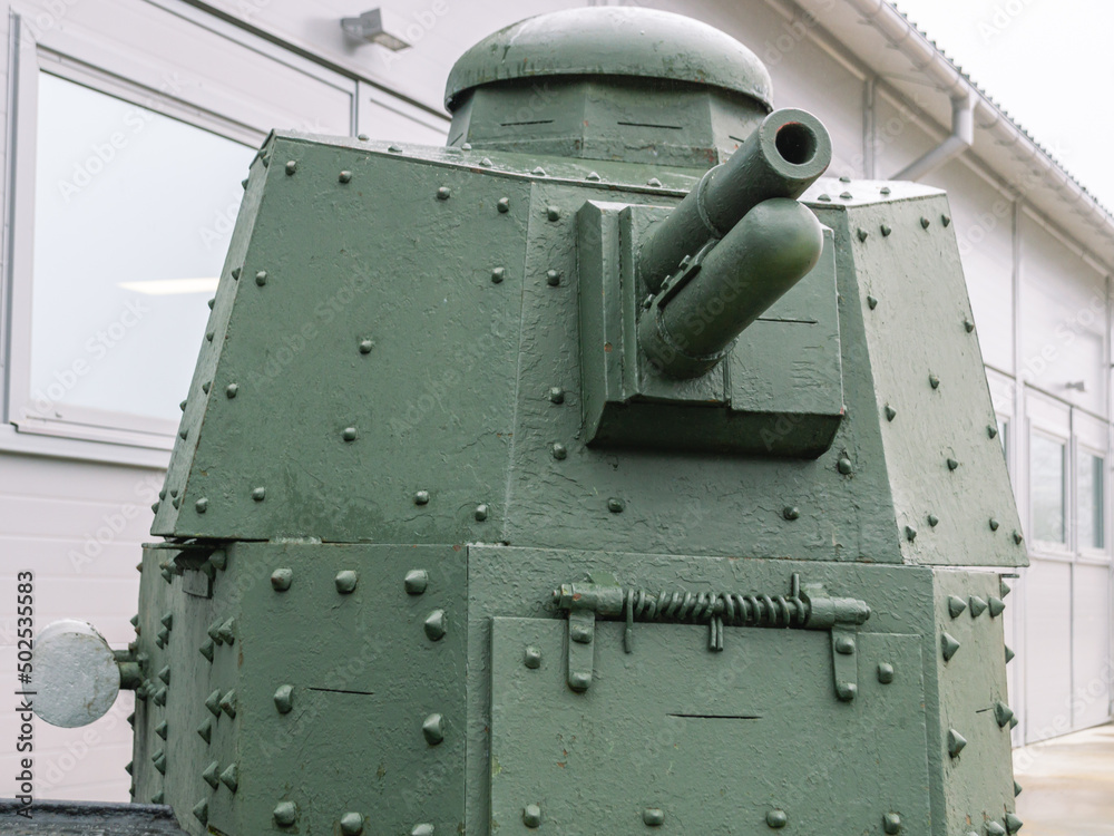 The tower of an old tank with a gun. Old armored vehicles. Tracked tank ...