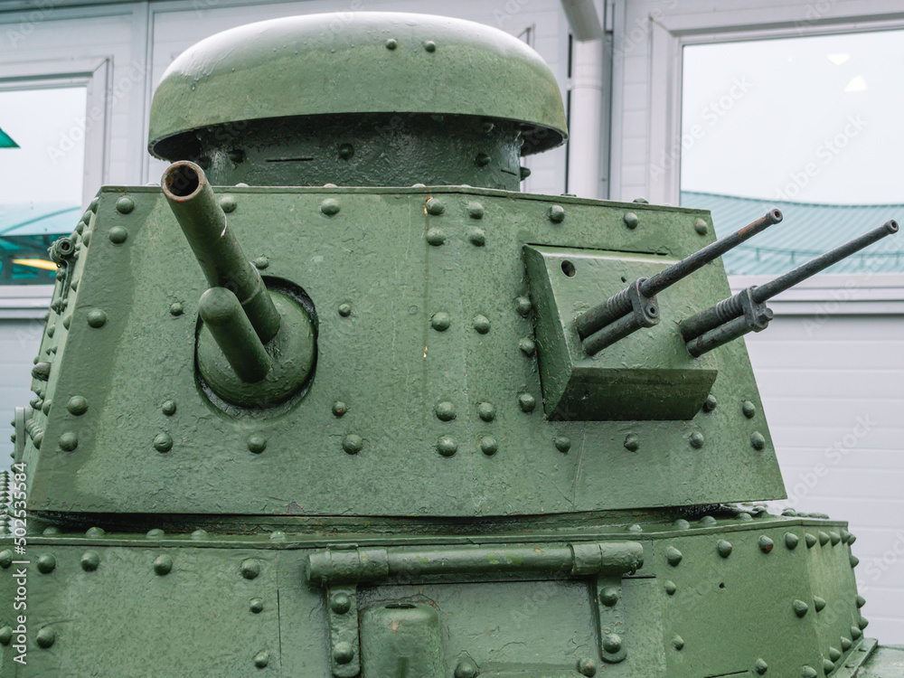 The tower of an old tank with a gun. Old armored vehicles. Tracked tank ...