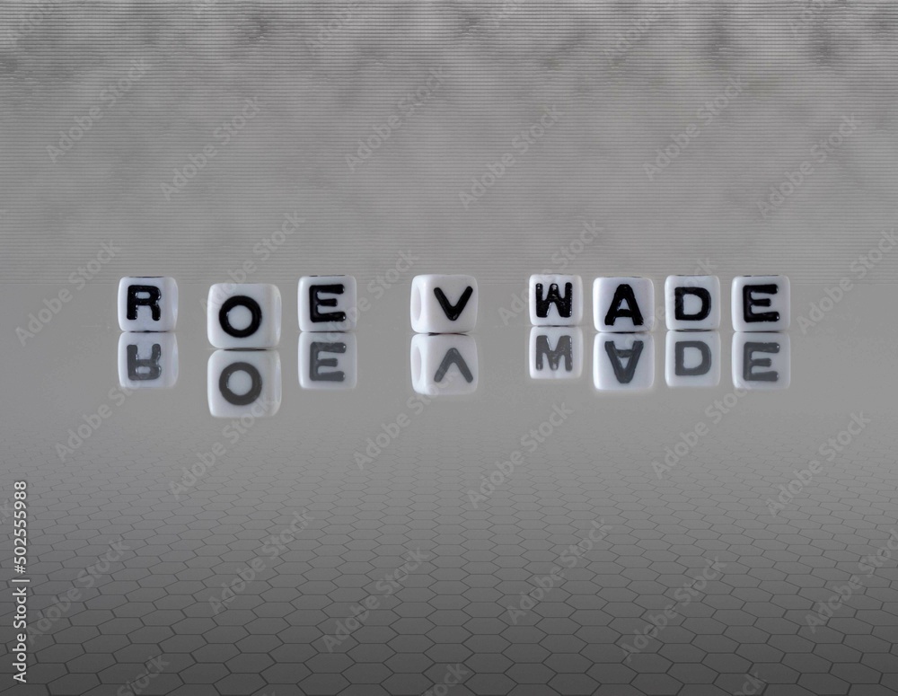 roe v wade word or concept represented by black and white letter cubes ...