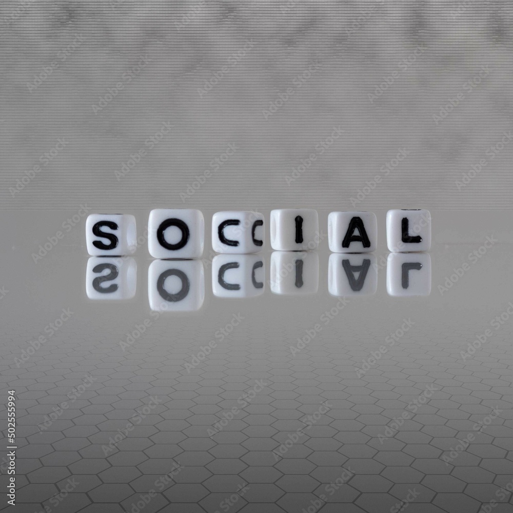 social word or concept represented by black and white letter cubes on a ...
