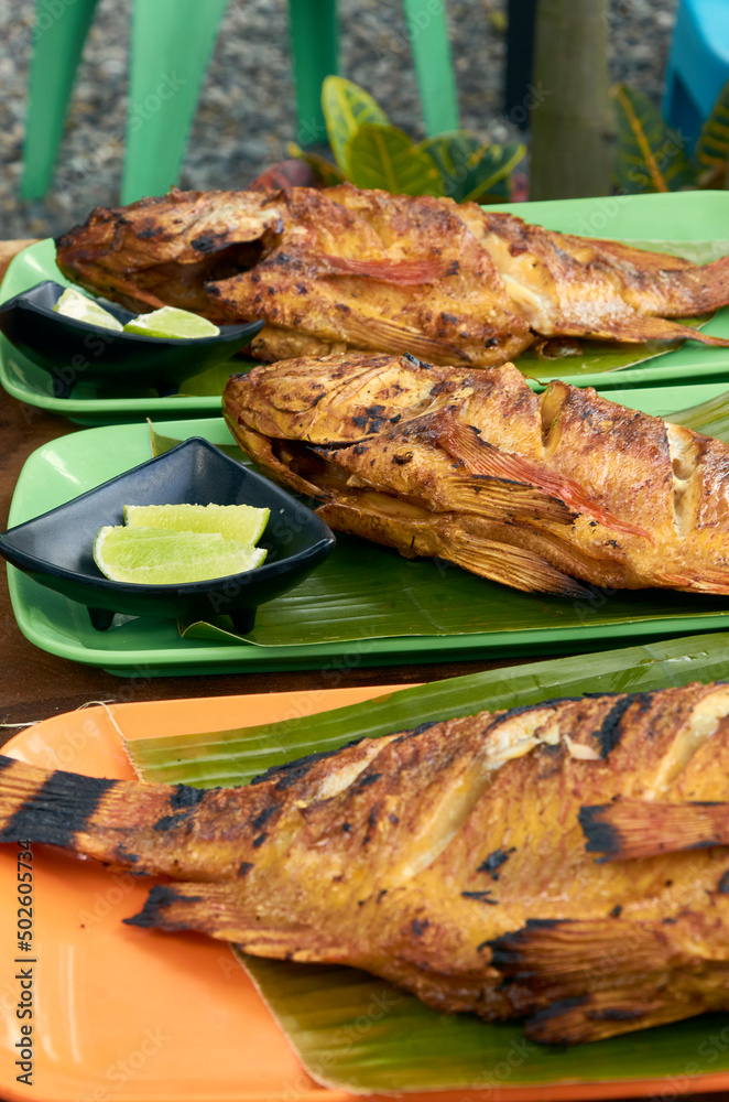 Pescado asado comida típica de Colombia Stock Photo | Adobe Stock