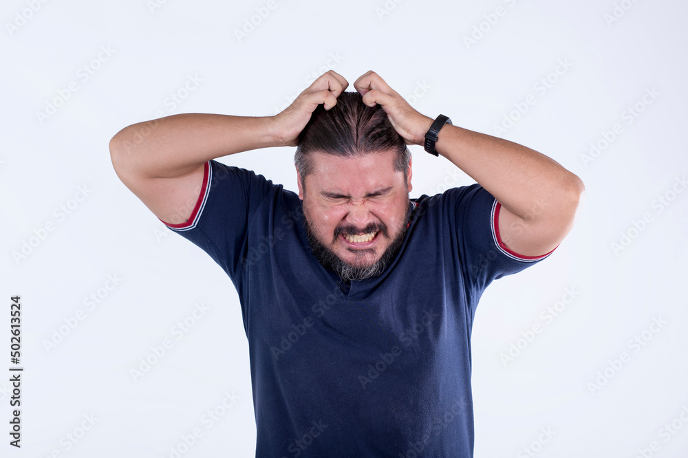 A surprised man scratches his head in disbelief and shock. Reaction ...