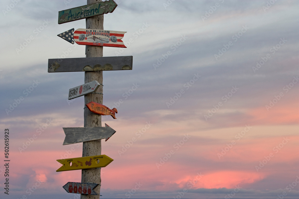Road signs on a wooden post, Fort Bulnes, Magellanes, Chile Stock Photo ...