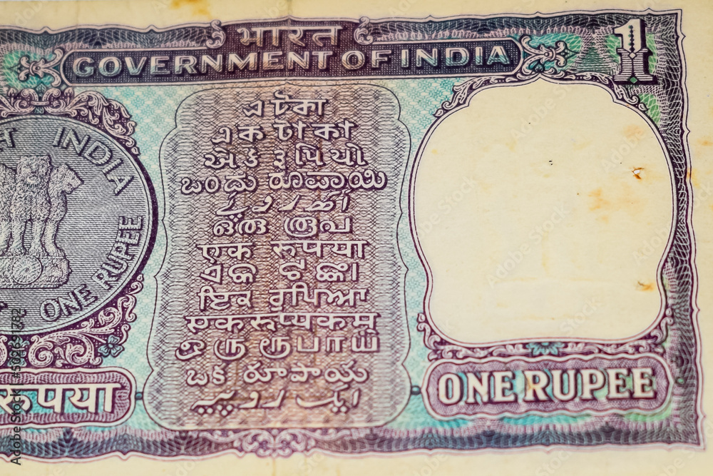 Old One Rupee notes combined on the table, India money on the rotating ...